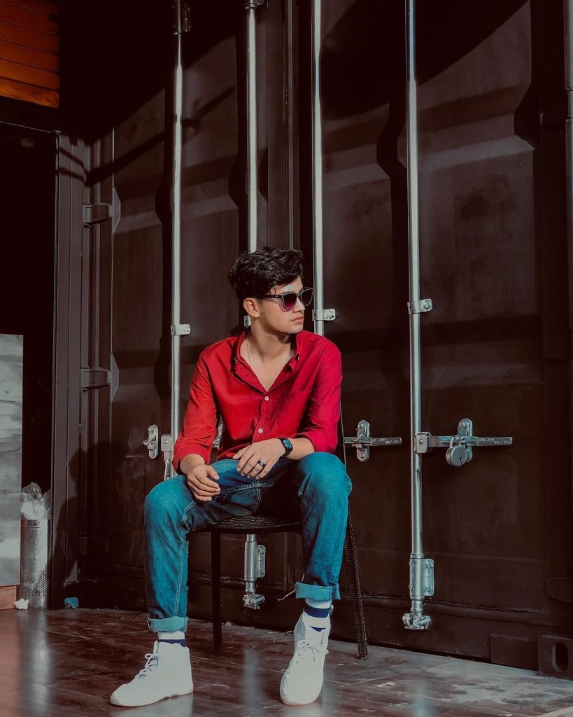 Model posing in red shirt - PixaHive