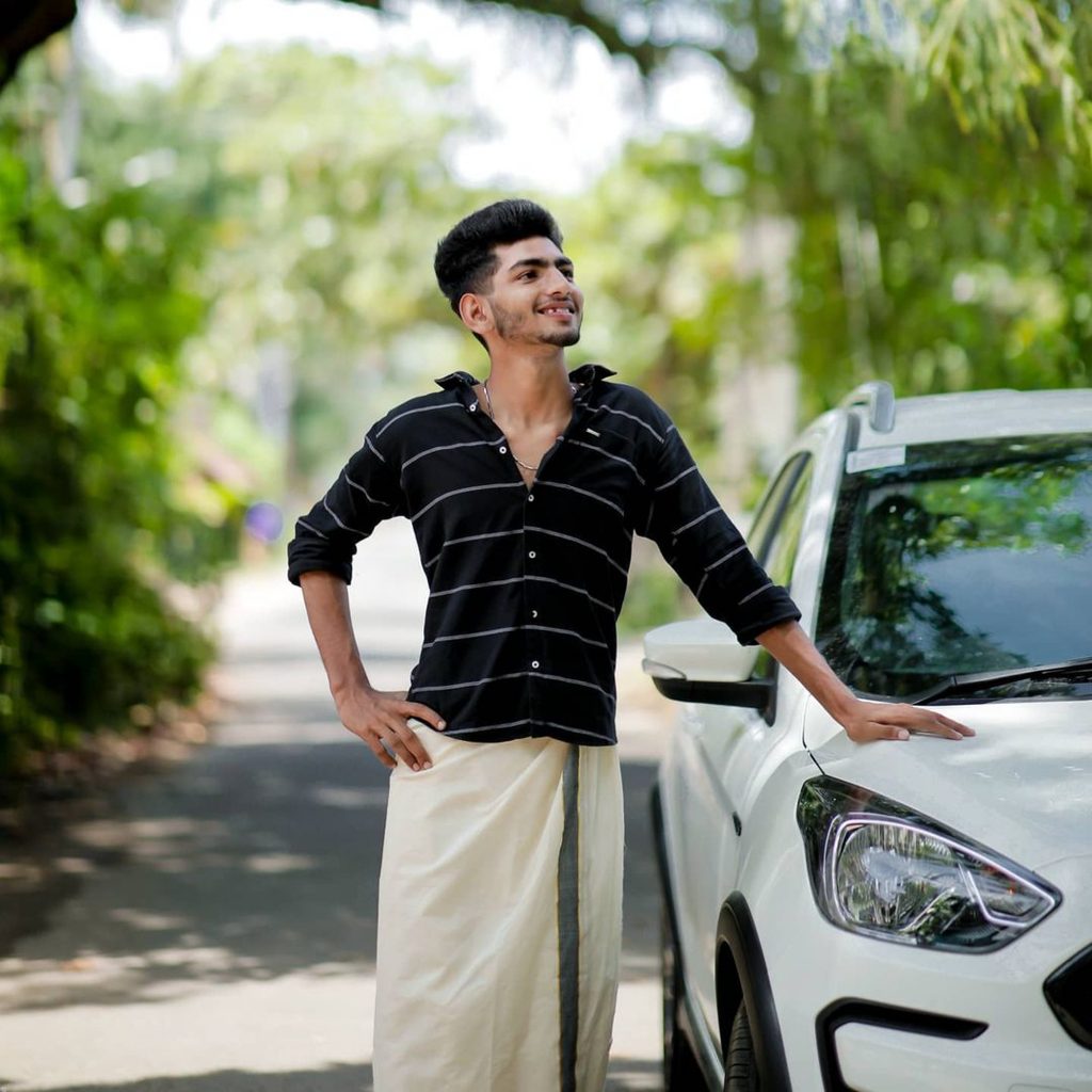 Model wearing lungi and posing near the car - PixaHive