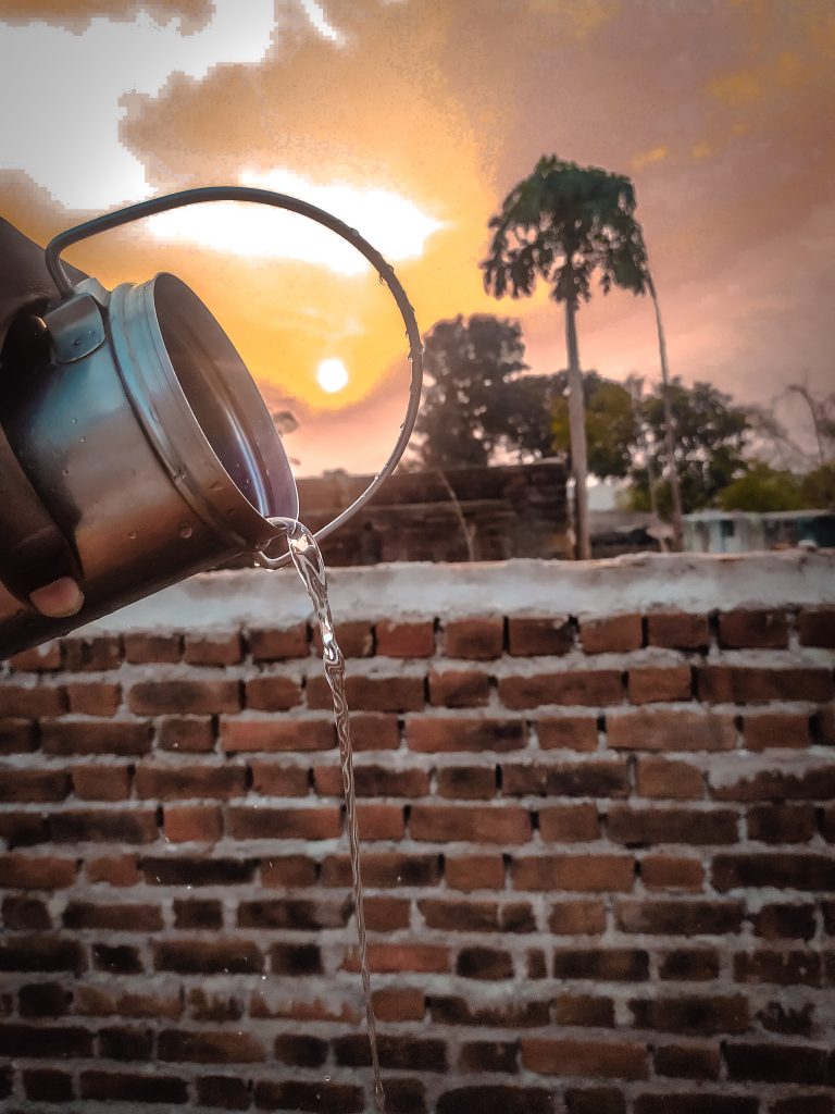 Pouring water from a pot - PixaHive