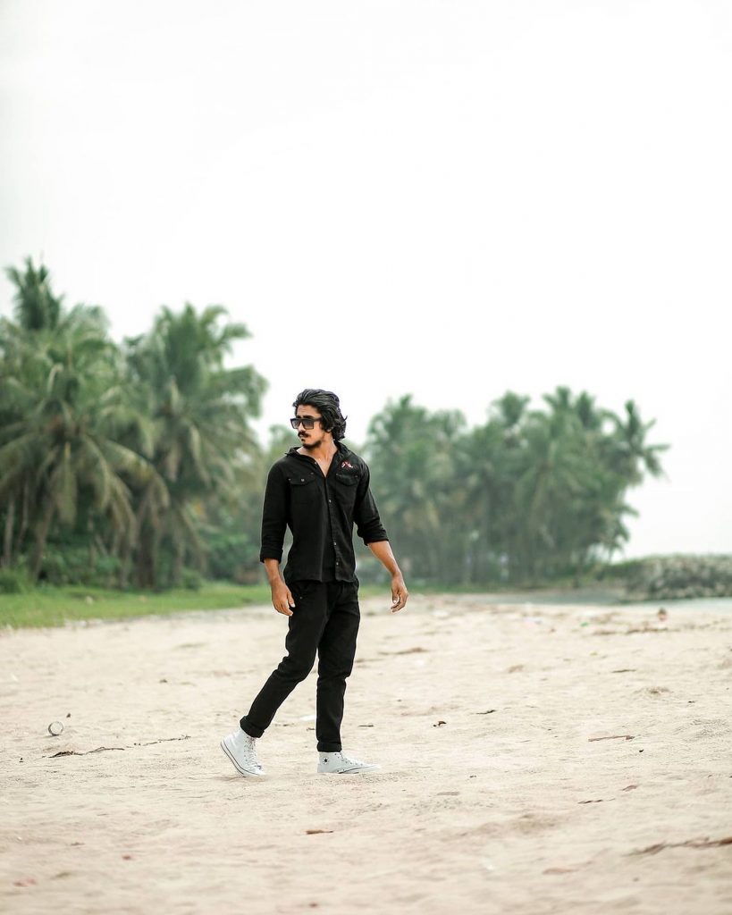 Stylish boy posing on the beach - PixaHive