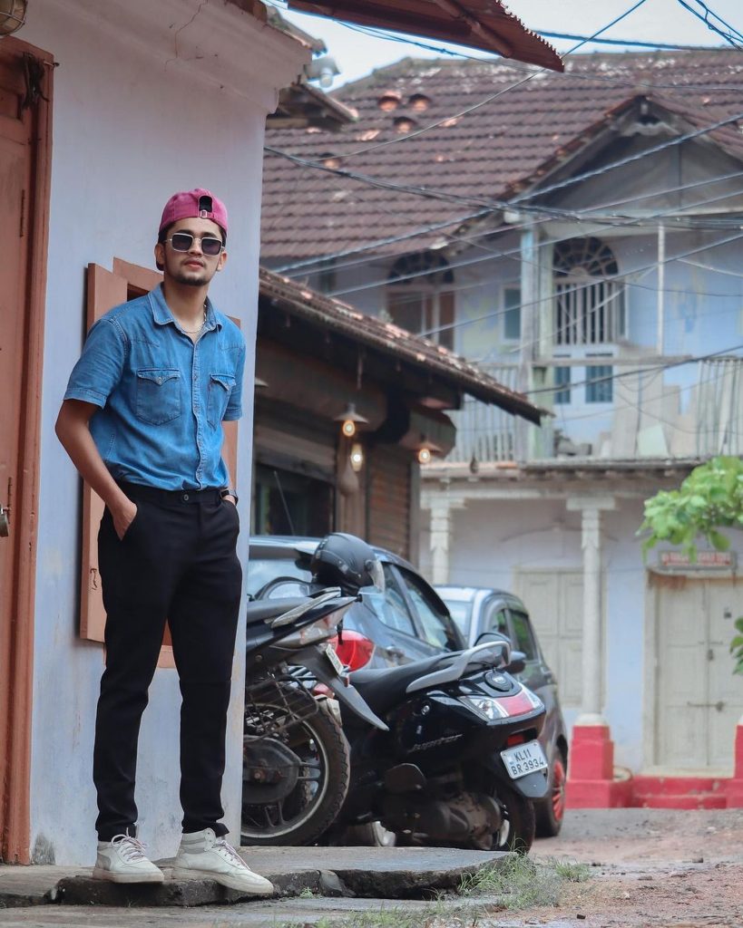 Stylish boy posing outside the house - PixaHive